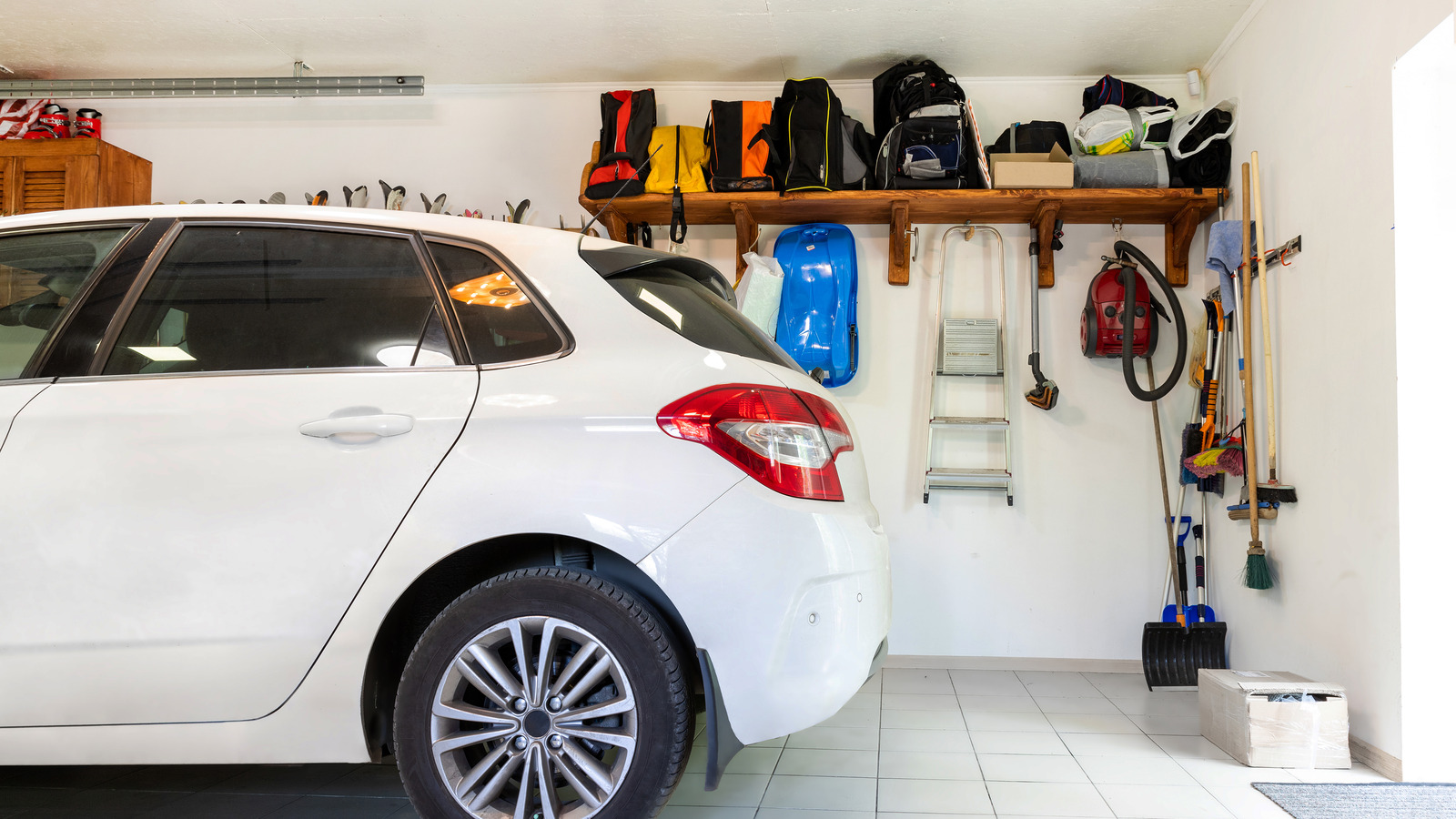 20 Clever Designs To Add Overhead Garage Storage Space