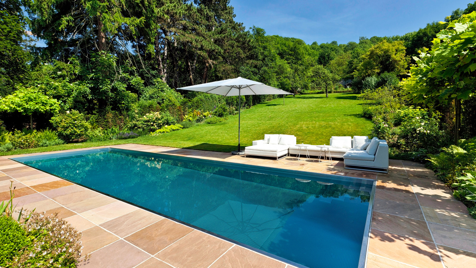 5 Messy Plants You Won't Want To Keep Poolside