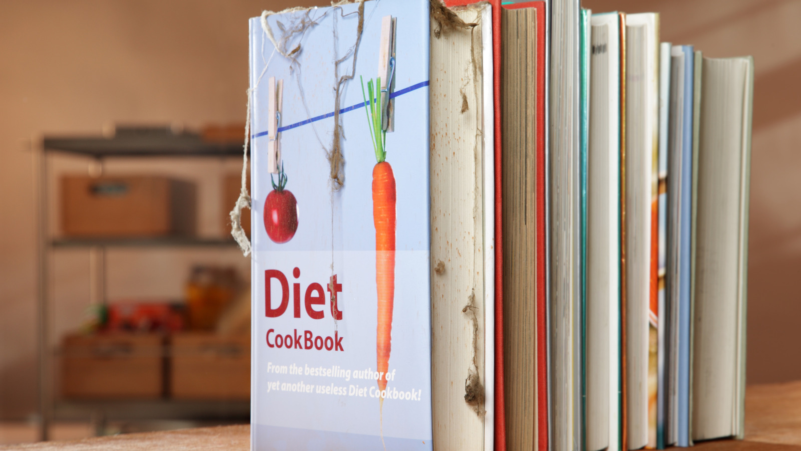 How To DIY An Adorable Cookbook Display Shelf For The Side Of Your Cabinet