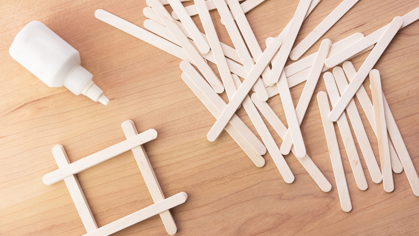 Add Warmth To Any Room In Your Home With This DIY Popsicle Stick Lamp