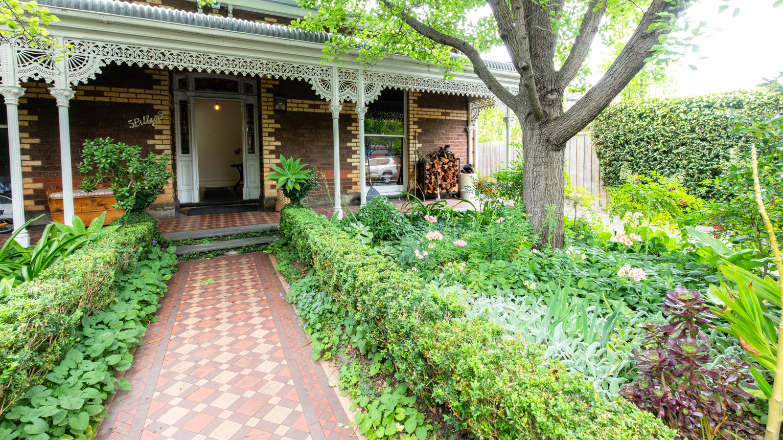 Boost Your Front Yard Landscaping With A Low-Maintenance Flowering Bush