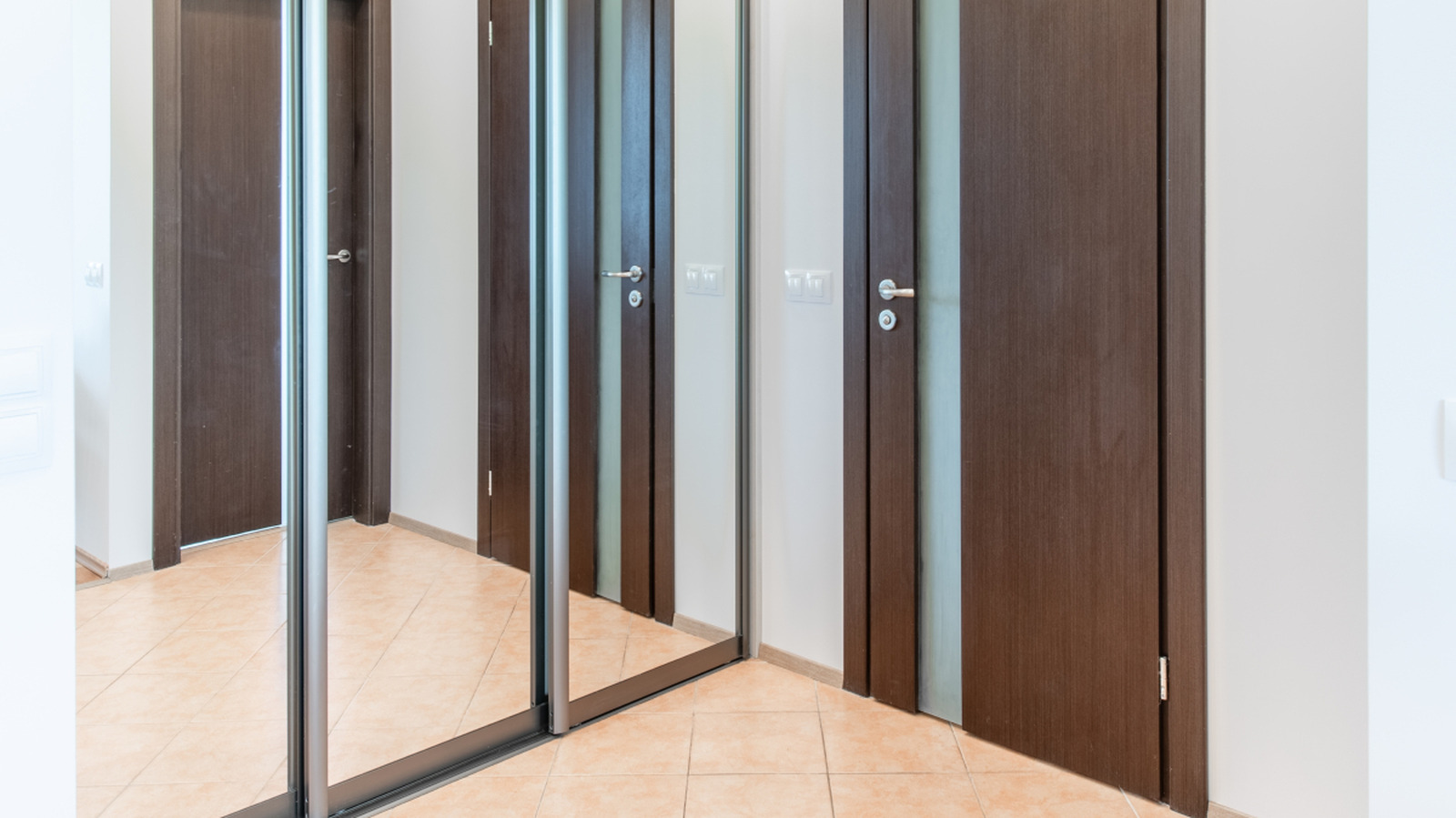 Cover Dated Mirrored Closet Doors With An Affordable Solution