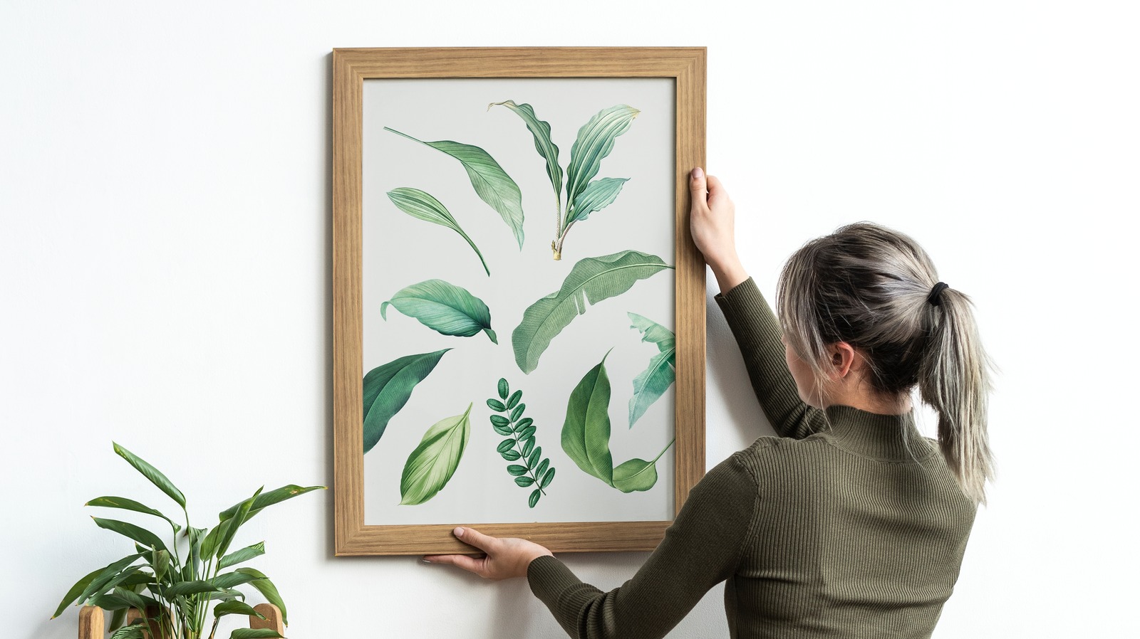 Create Stylish Hidden Cabinet Storage With This Genius Wall Art Idea