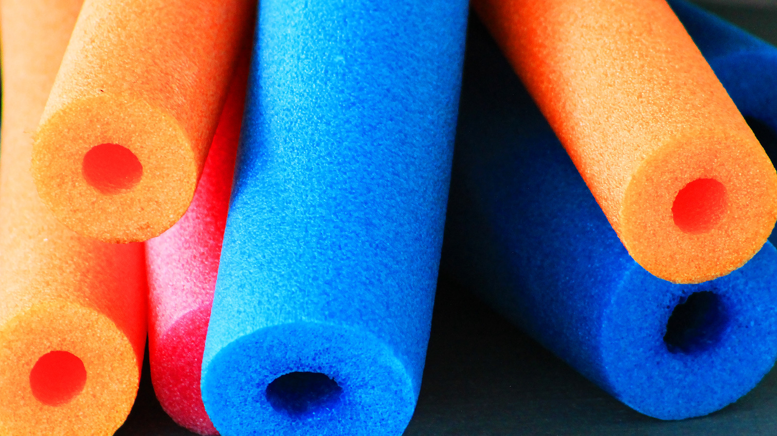 DIY A Magical Candy Land For Trick-Or-Treaters With This Pool Noodle Hack