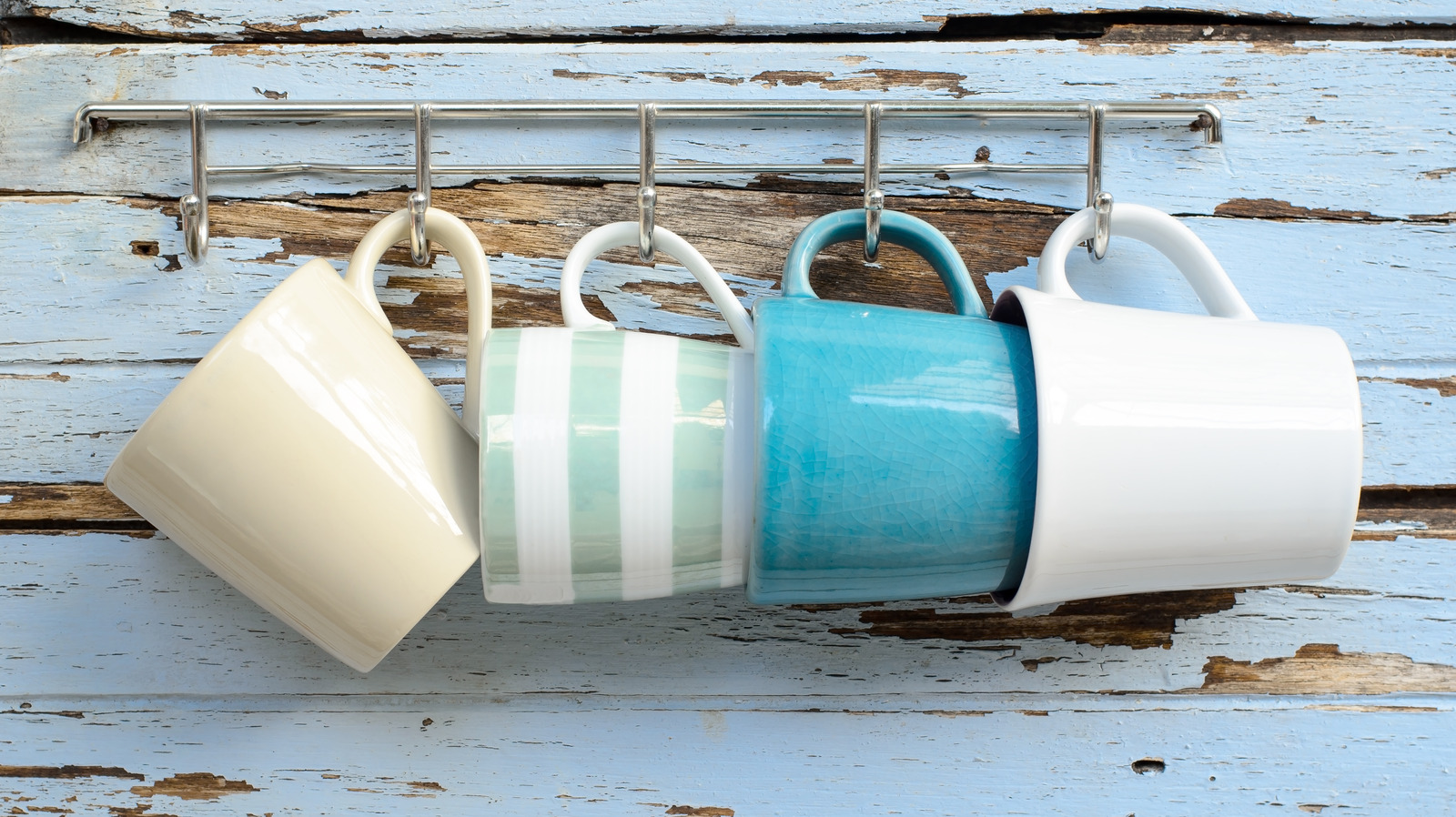 DIY Extra Storage For Your Kitchen With This Easy Dollar Tree Broom Hack