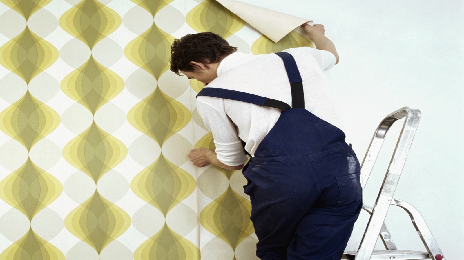 Elevate The Look Of Wallpaper By Hiding Seams With A Helpful Tool You Already Own