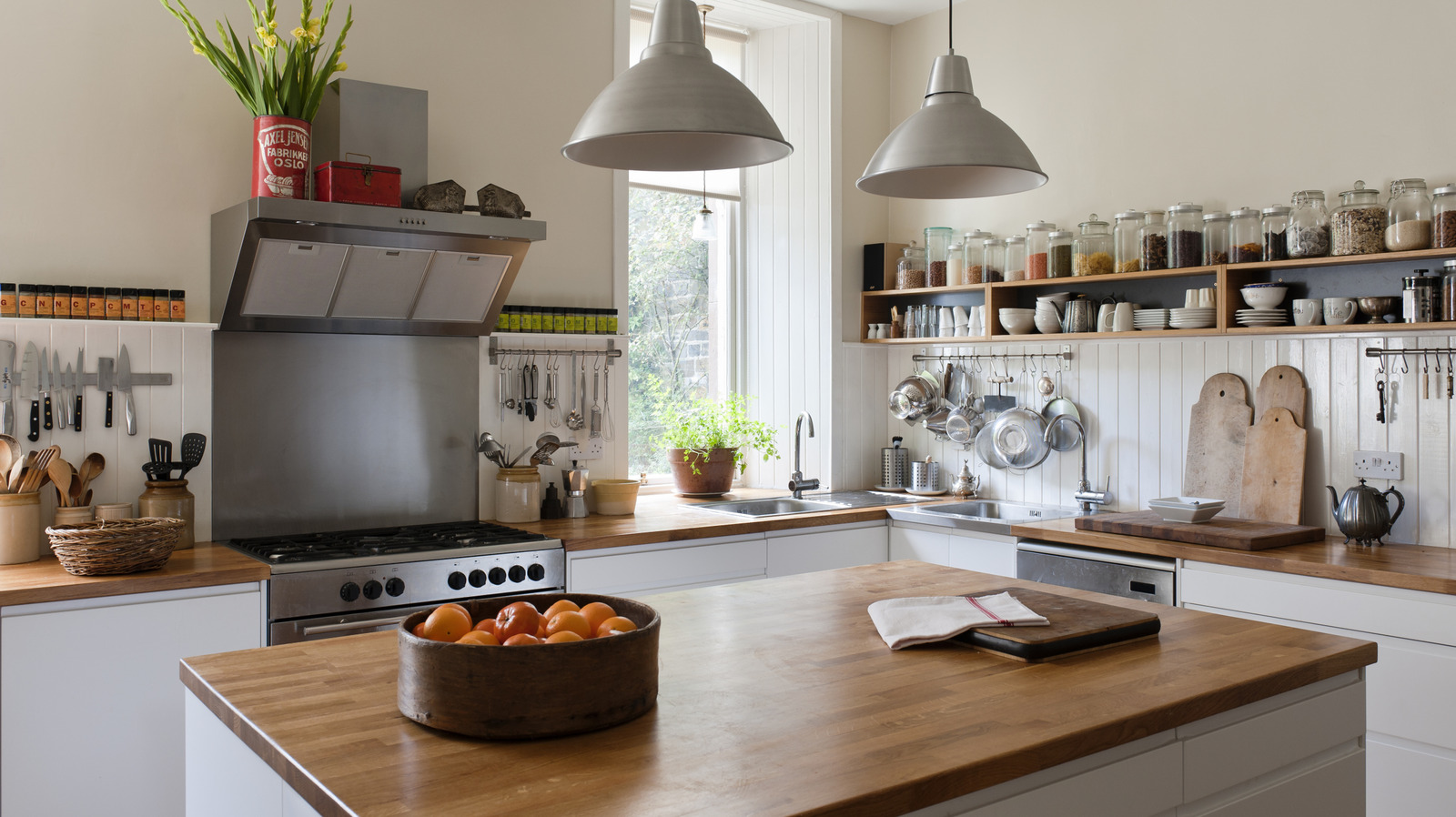 Add Extra Counter Space To Your Kitchen With A Hidden Pull-Out Solution