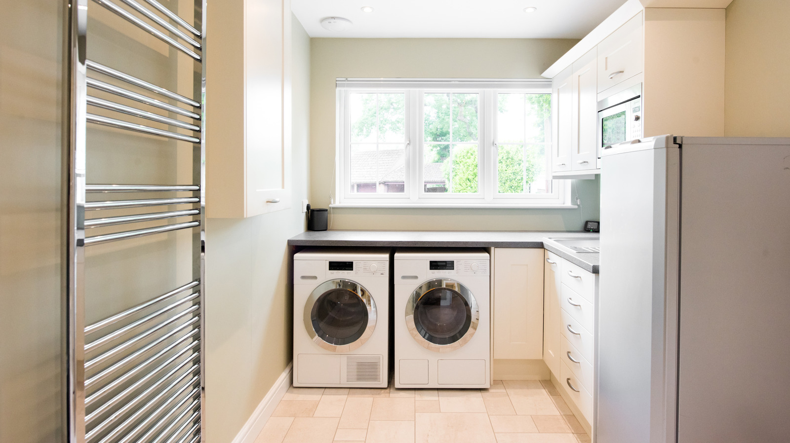 How To Give Your Laundry Room A Luxe Upgrade With Mosaic Tile