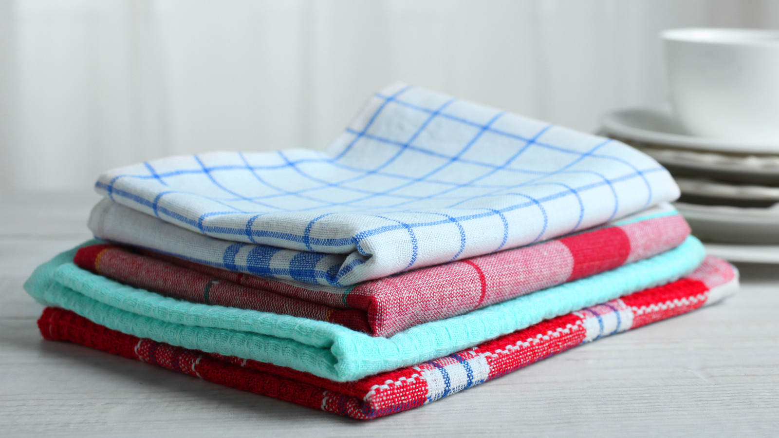 Goodbye, Dish Towel Clutter: This Space-Saving Storage Hack Keeps Them ...