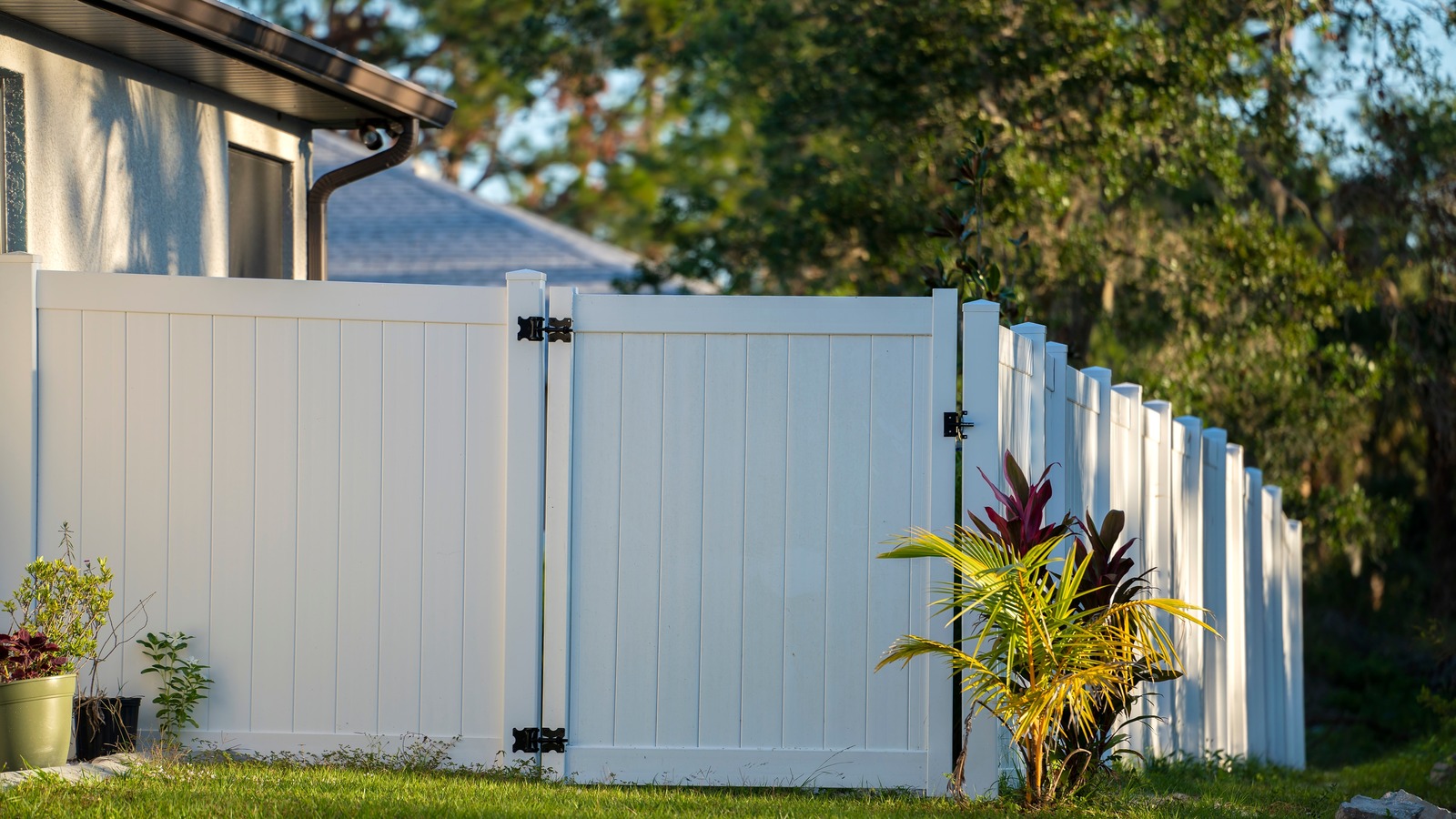Here's How To DIY A Vinyl Fence Install For Affordable And Stylish Privacy
