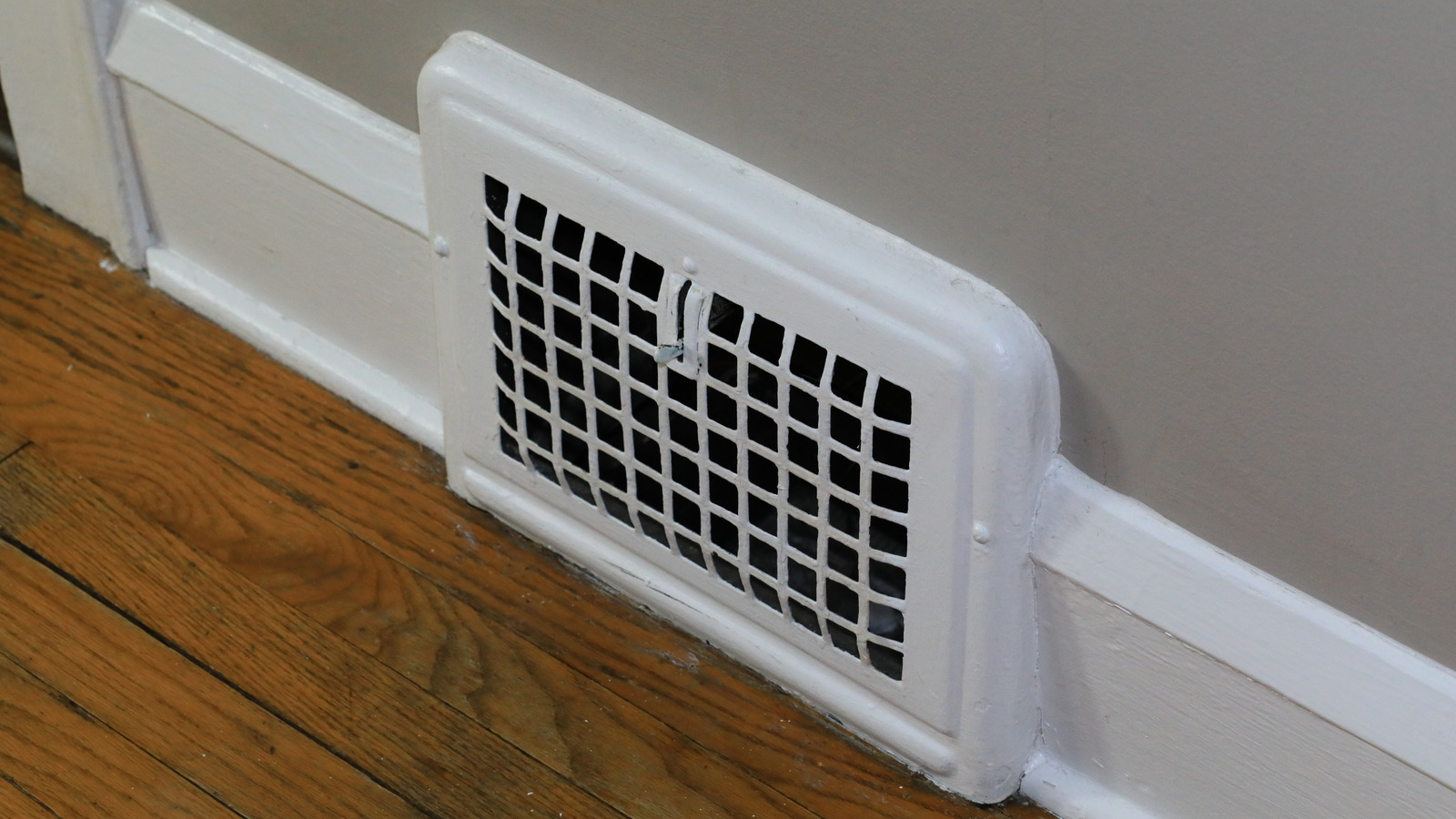 Hide Ugly Air Vents With An Easy Solution That Doubles As Extra Storage