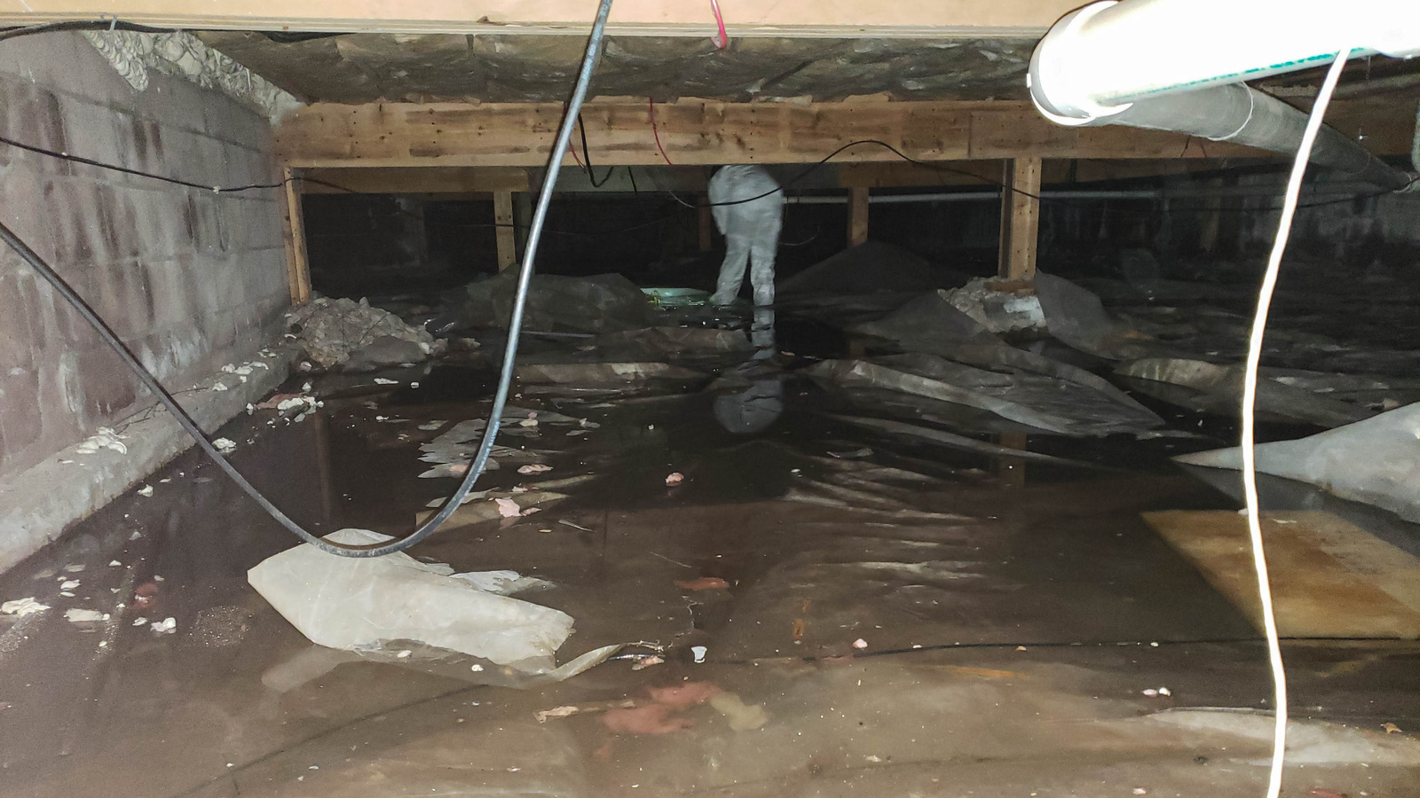 How To Get Rid Of Water That's Flooded Your Crawl Space (& When To Call ...