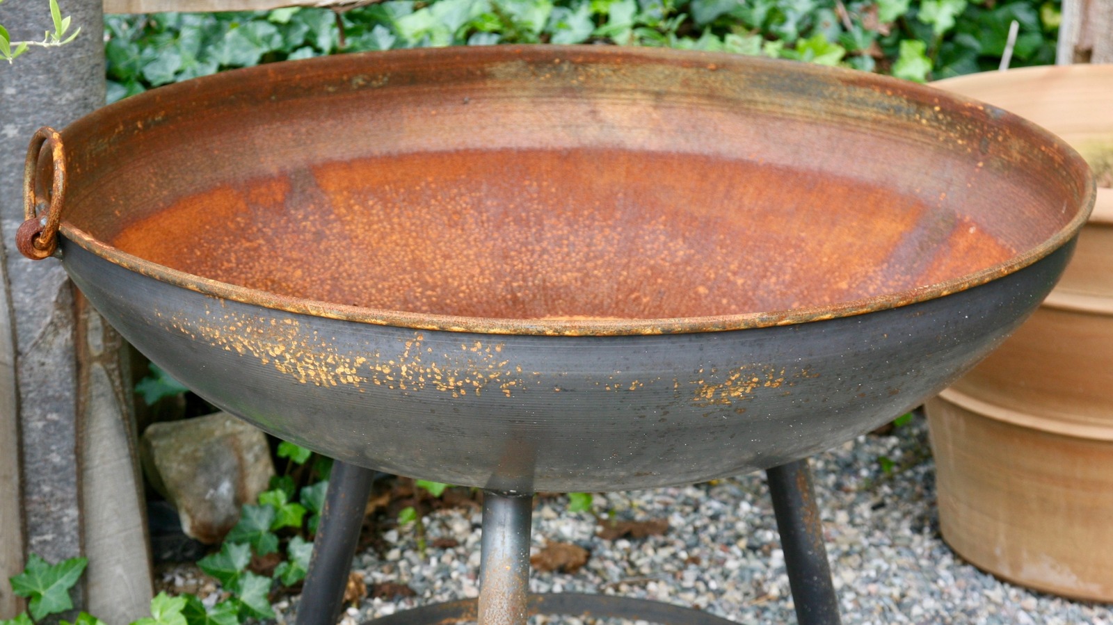 How To Reuse A Rusty Firepit & Kettle For An Adorable Garden Feature