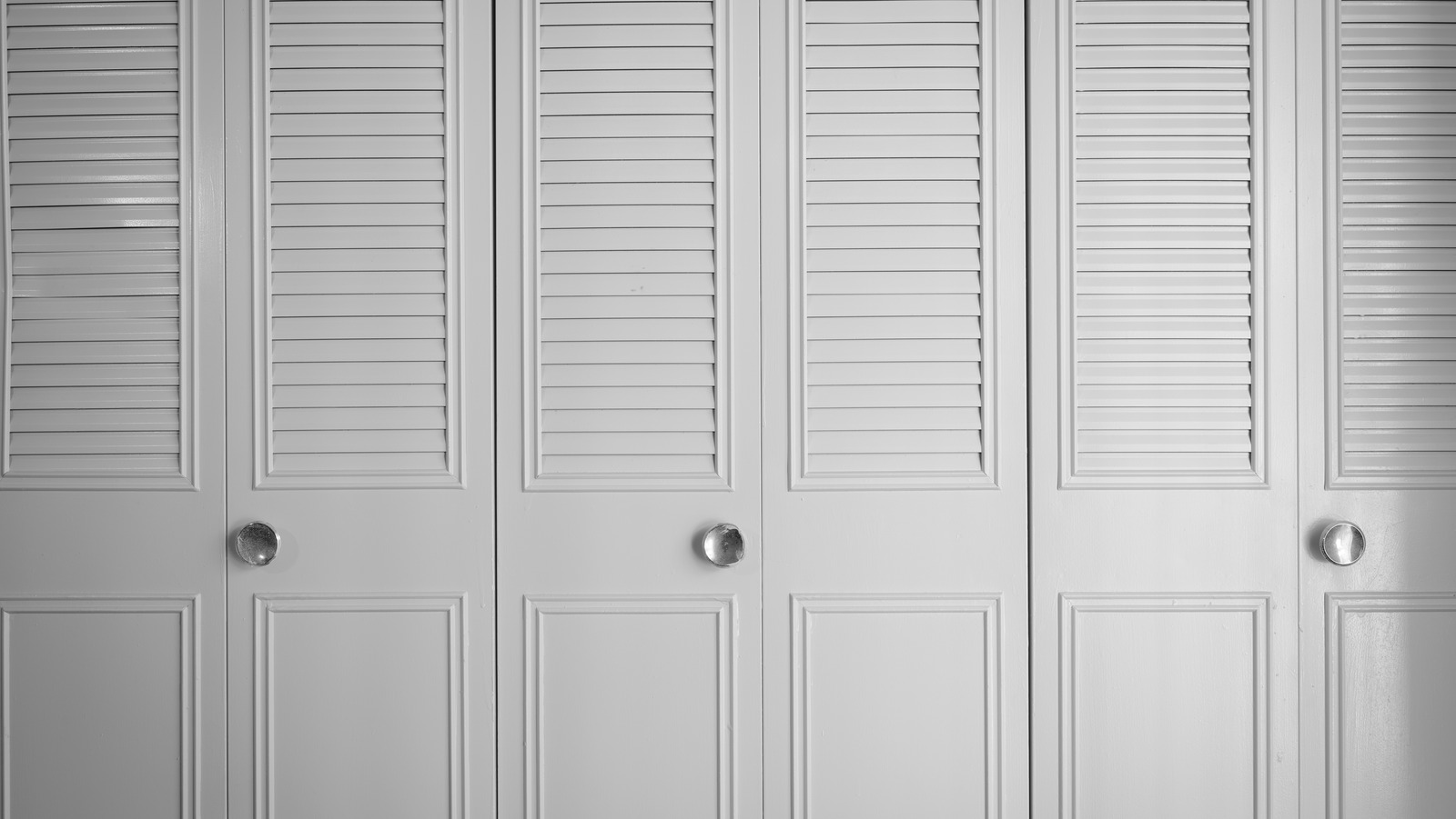 How To Transform Outdated Louvered Doors With A Chic Fabric DIY