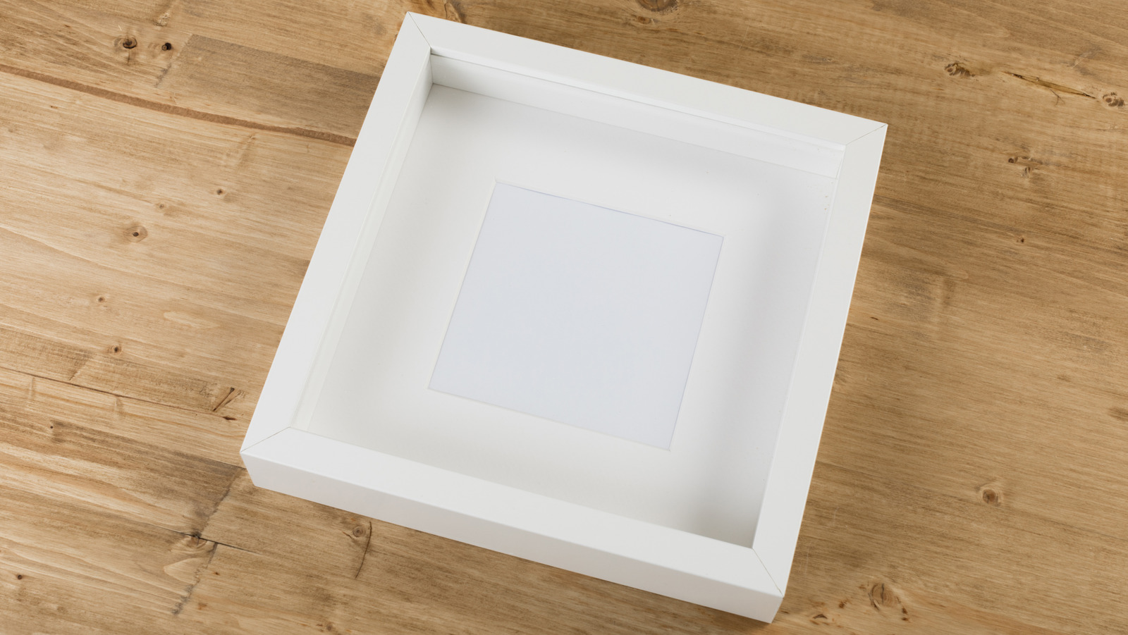 How To Easily Turn A Basic IKEA Frame Into A Cozy Bookshelf