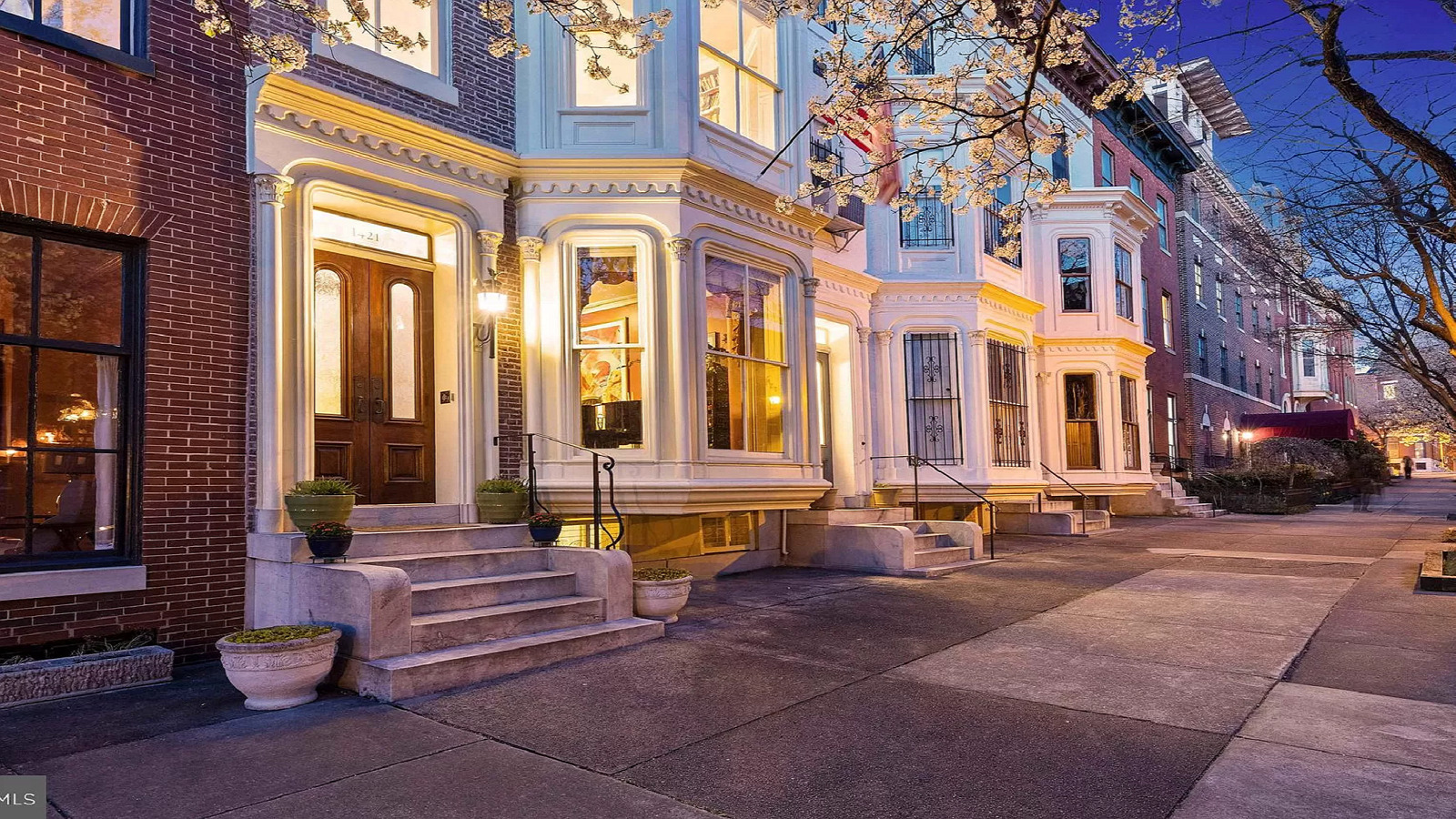 Look Inside An Eclectic Baltimore Home Featuring Stunning Murals For $850K