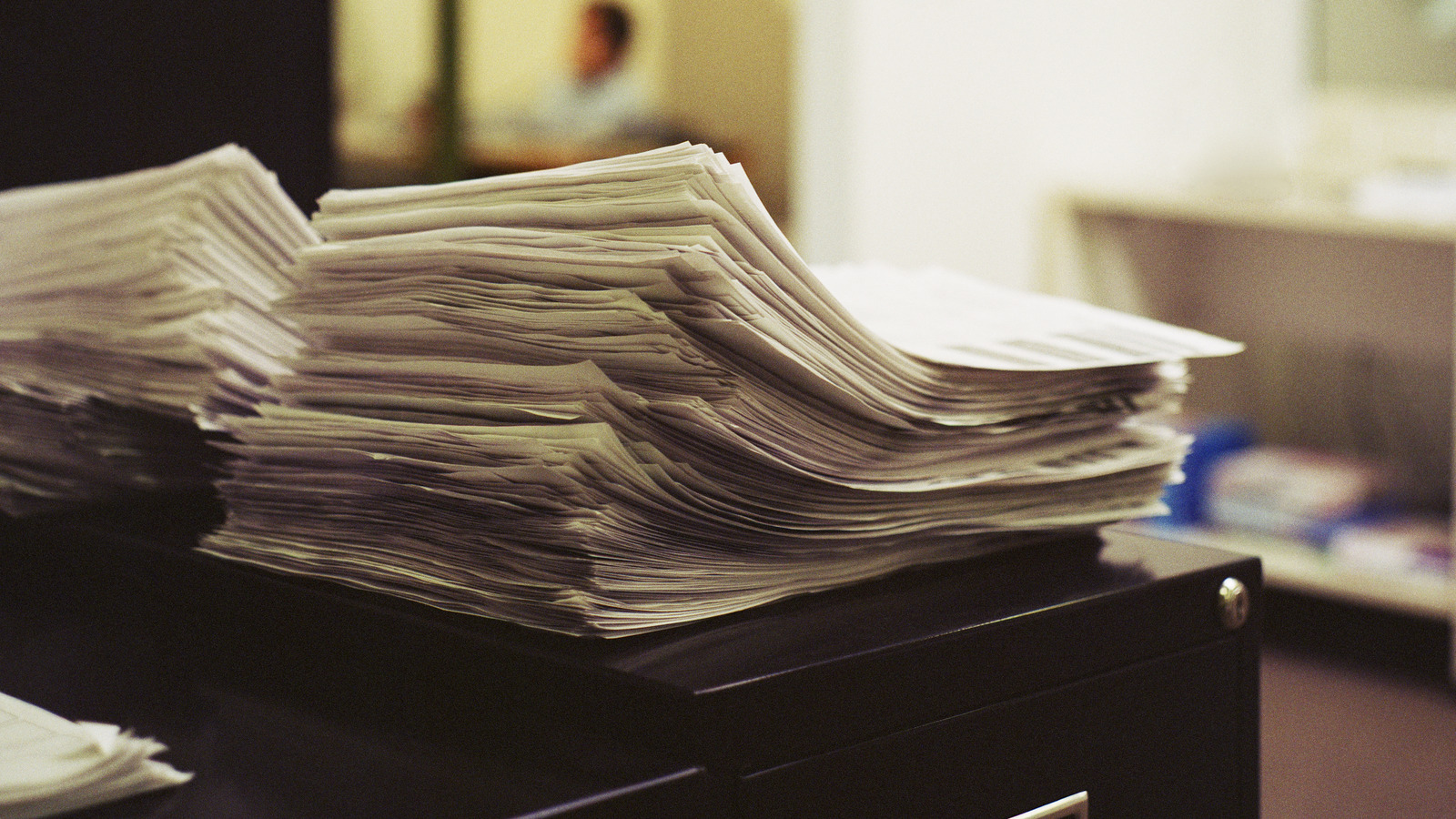 Organize That Stack Of Papers Once & For All With A Clever Dish Rack Hack
