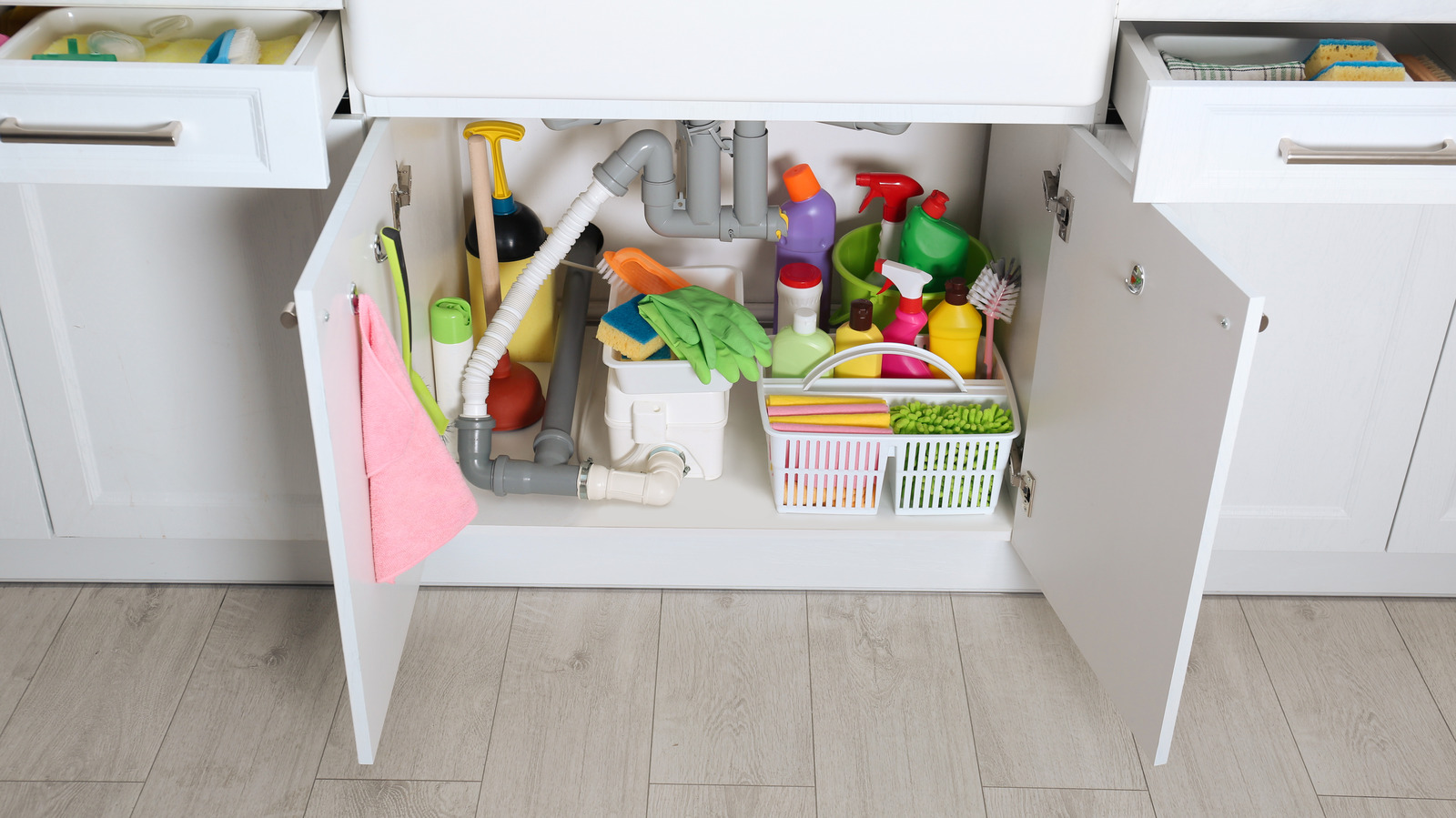 Organize Your Cleaning Cabinet With A Simple Paper Towel Holder Hack