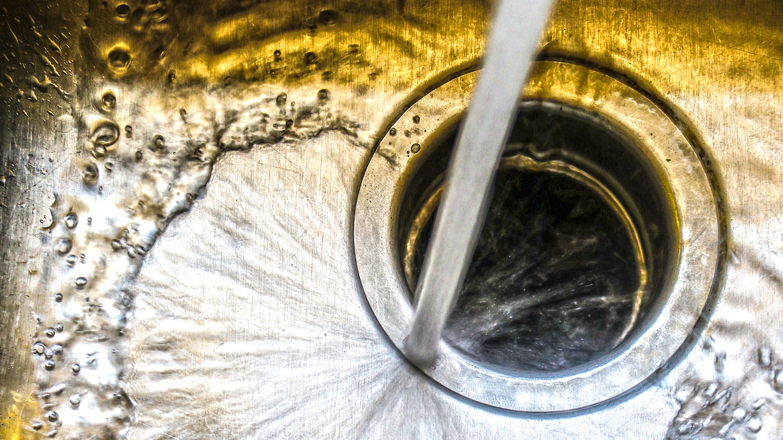 Stinky Garbage Disposal? There's One Spot You're Likely Overlooking