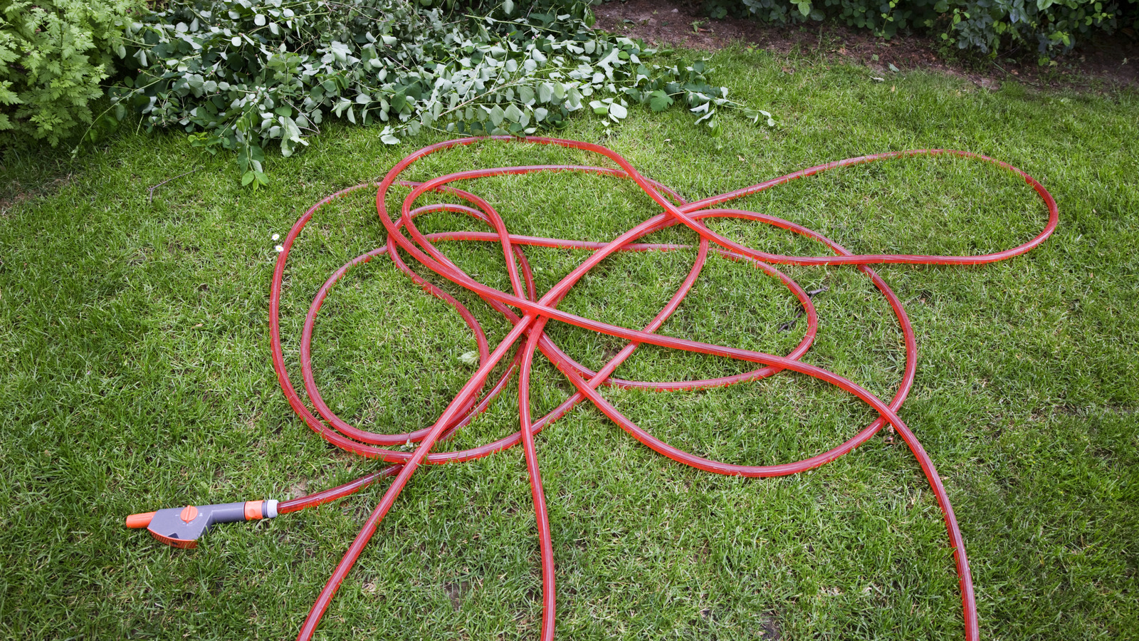 The Chic Storage Hack To Keep Your Garden Hose And Cords Organized