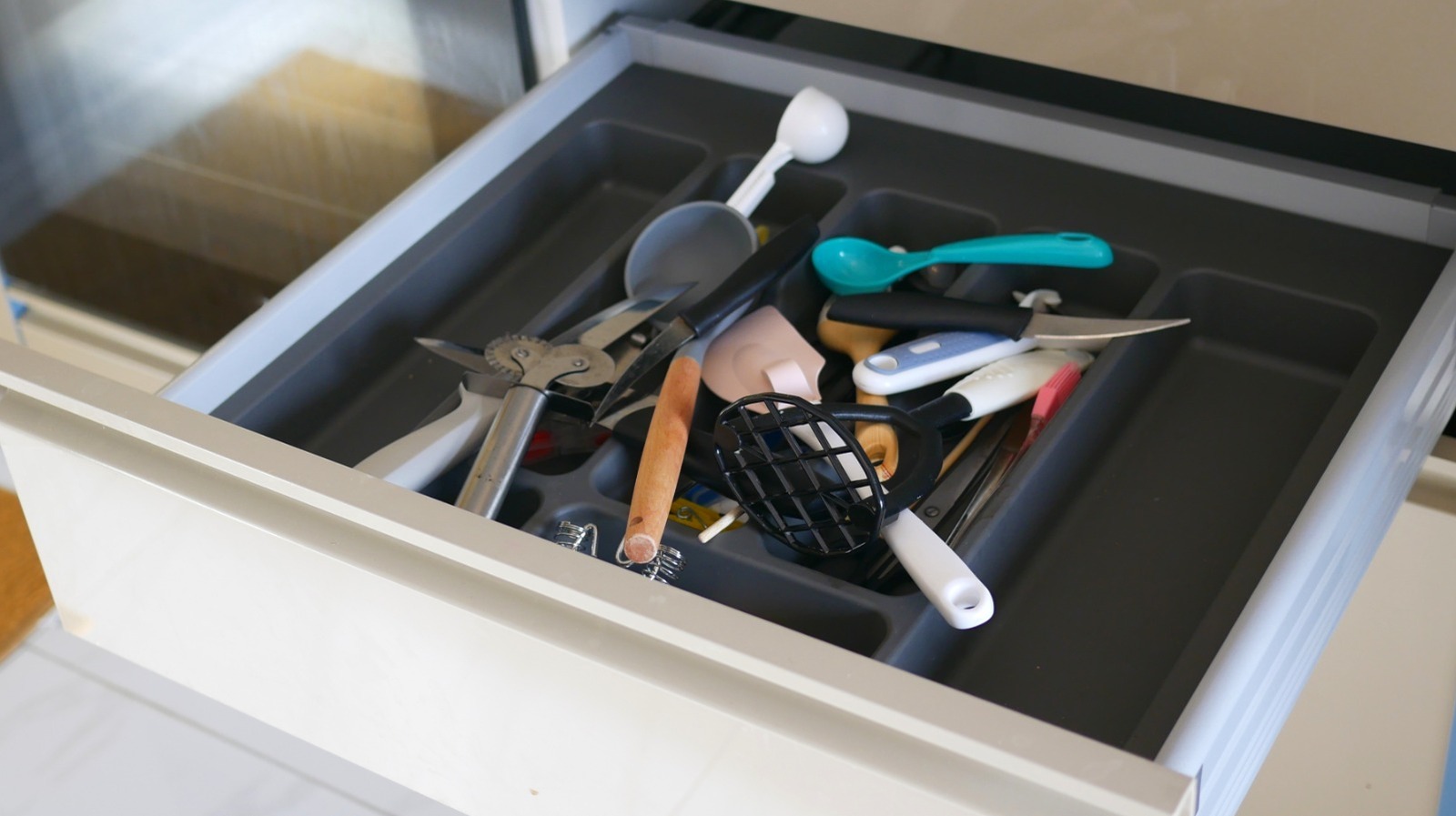 Organize Utensils In Your Kitchen With An Easy Cabinet Storage Hack