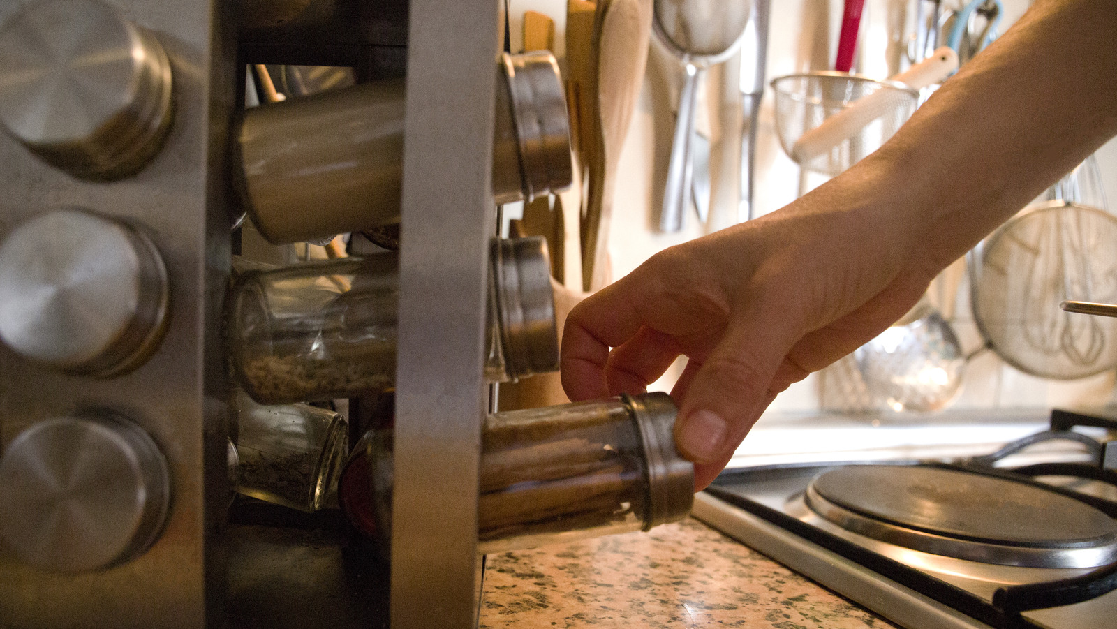 The Genius Way To Hide Your Spice Rack For A Seamless Kitchen