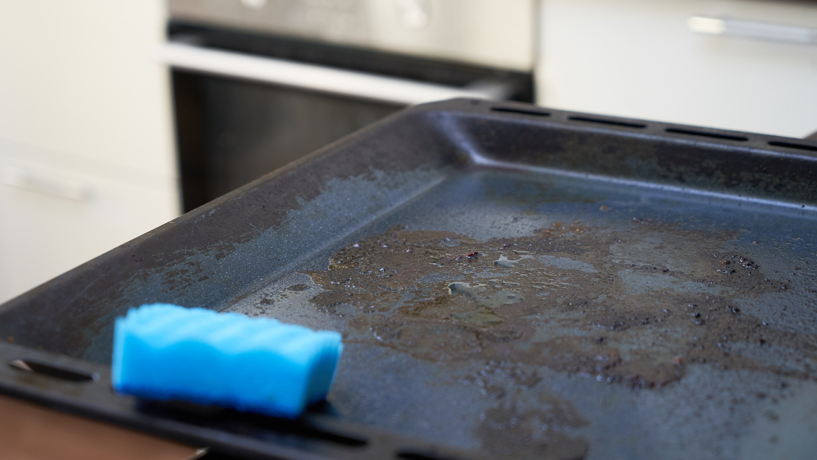 The Most Important Step When Cleaning Burnt Messes From A Baking Sheet