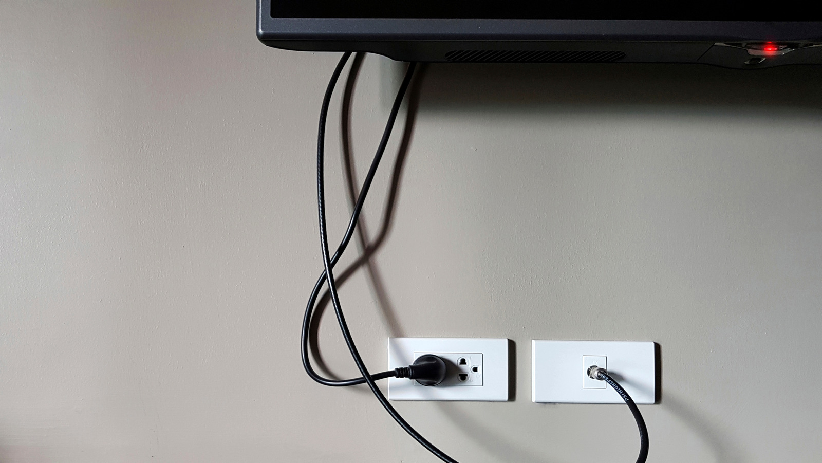 The Painters Tape Hack That Ensures Your Cord Covers Are Renter-Friendly