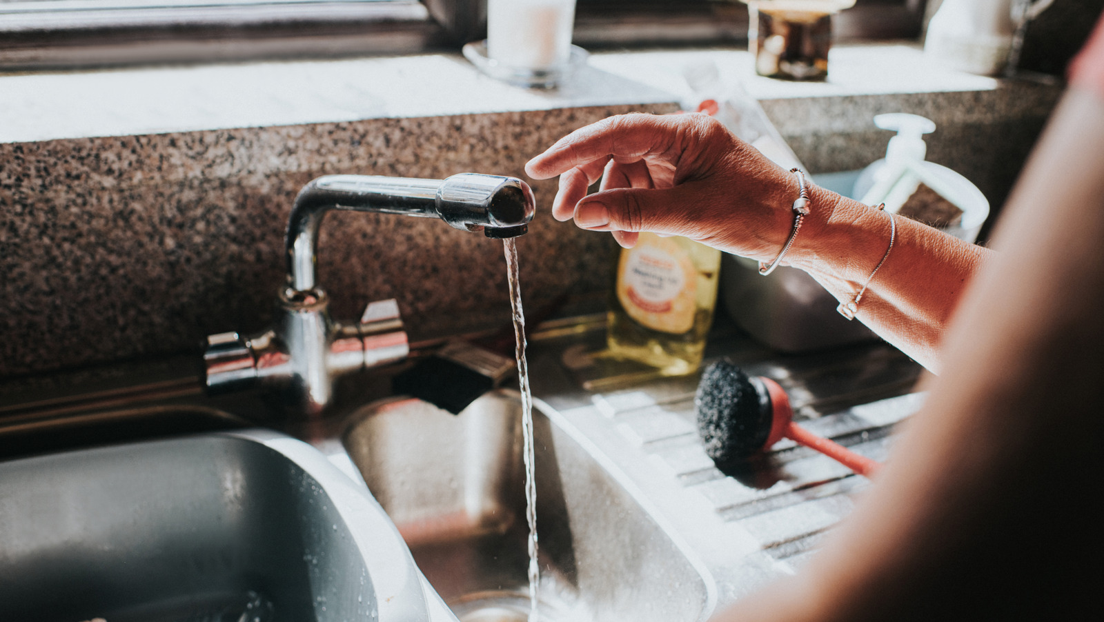 The Sneaky Problem That's Causing Low Water Pressure In Your Kitchen Sink