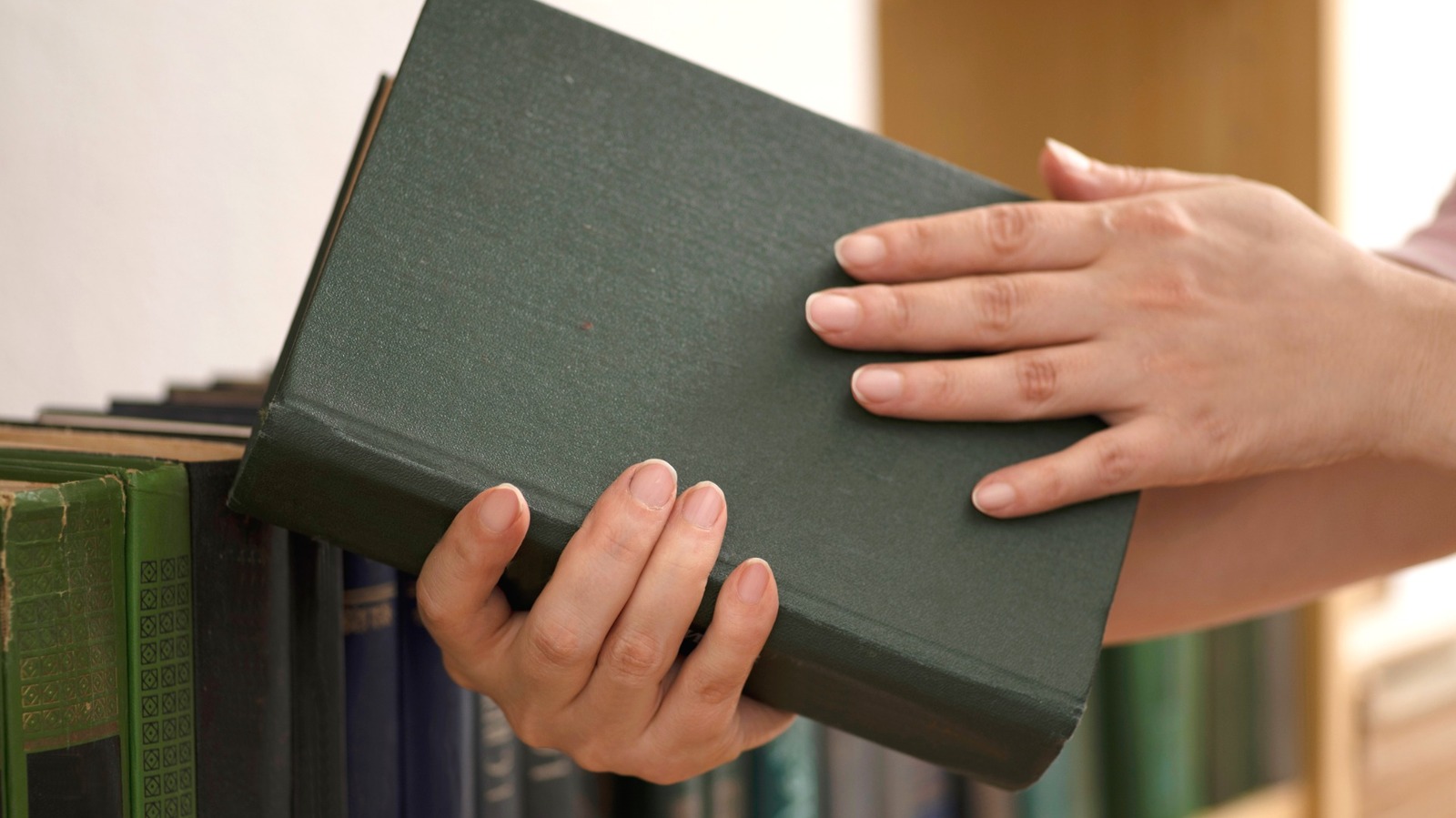 Turn Old Books Into Hidden Storage Bins For Your Bookshelf With A ...