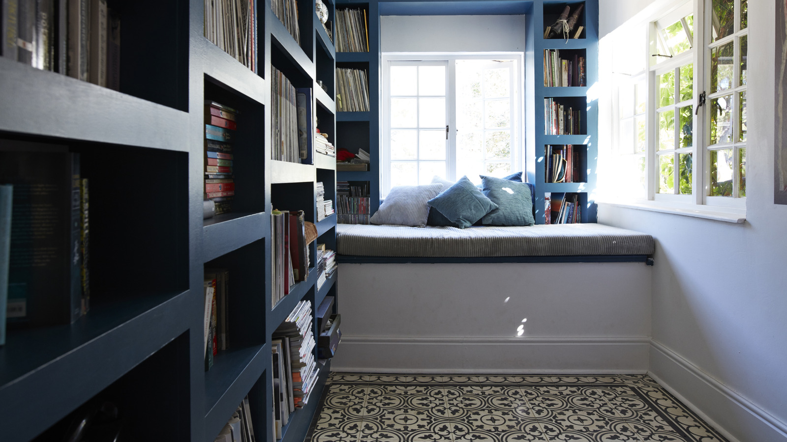 Turn Your Closet Into A Mini Library With DIY Pallet Shelves