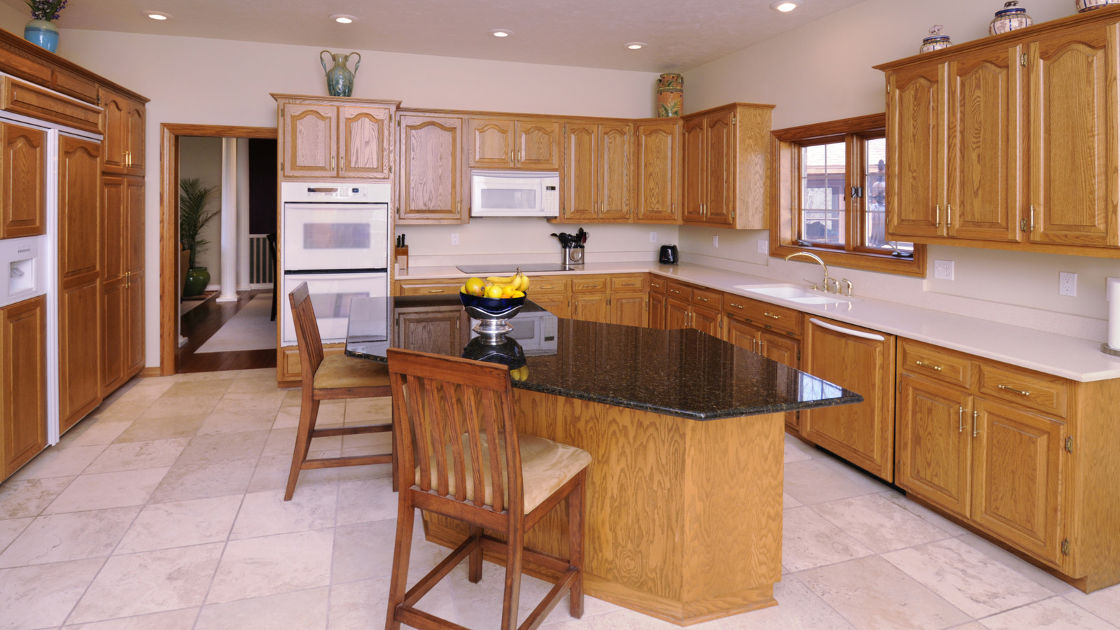 Update Outdated Oak Cabinets By Painting Your Kitchen