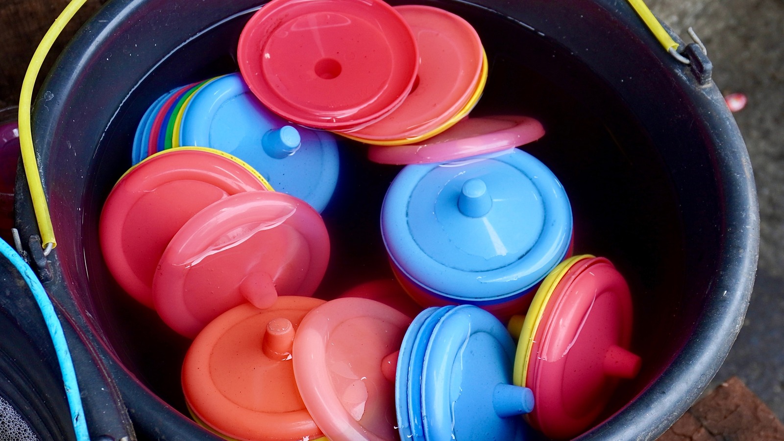 Use A Craft Room Staple To Clean Mold From Tricky Drinkware Lids