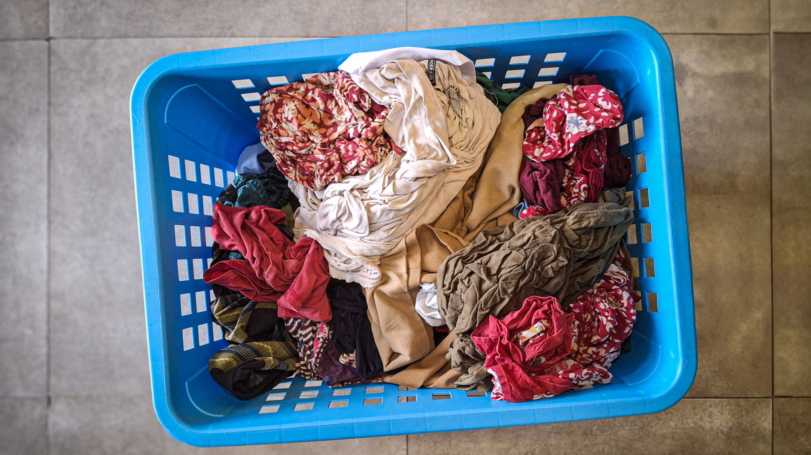 Why Throwing Wet Clothes In Your Laundry Hamper Is A Bad Idea