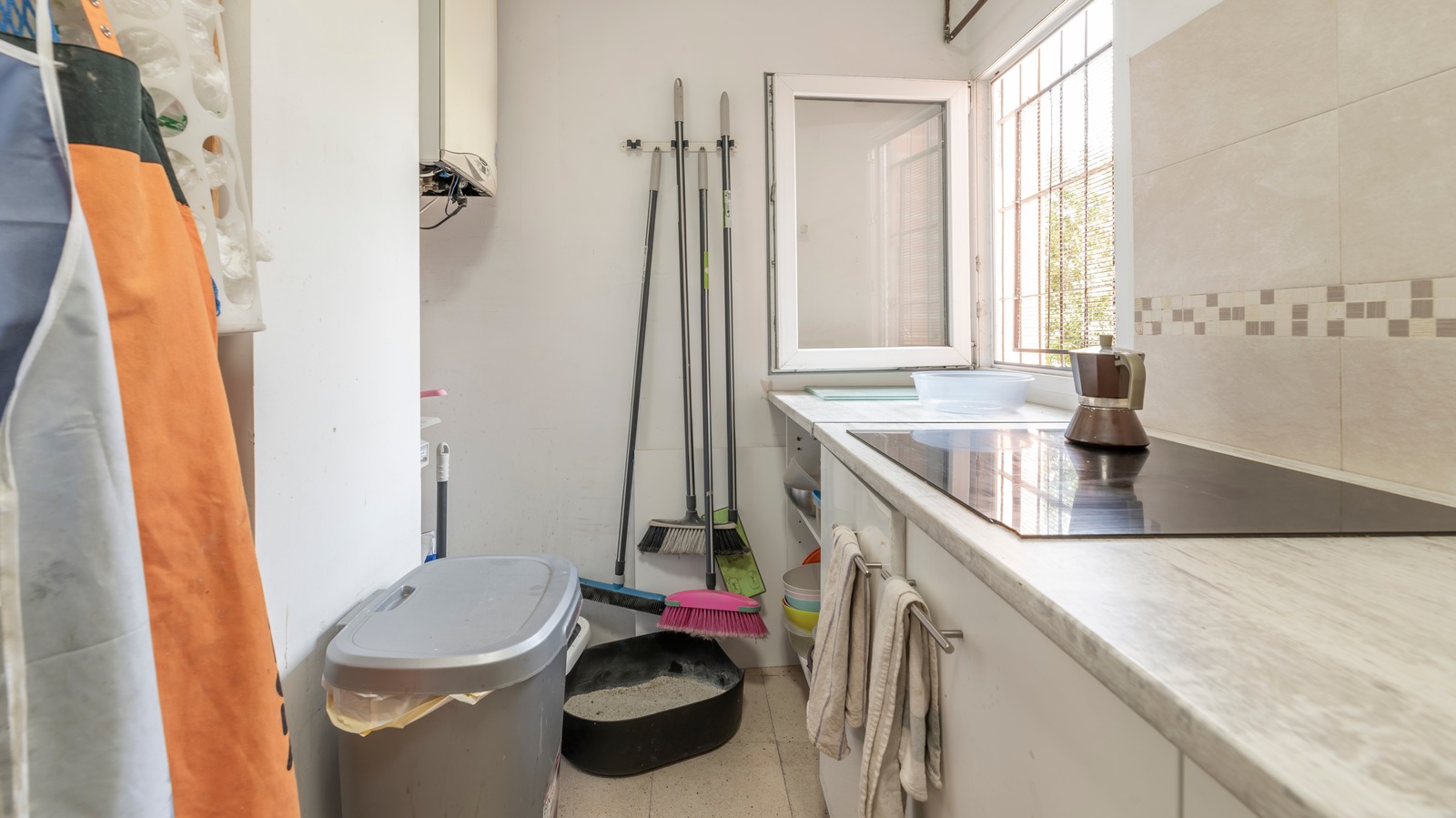 Woman's Smart IKEA Solution Keeps Cleaning Supplies Organized & Eyesores Hidden